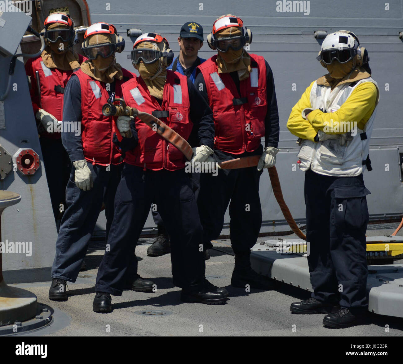 Sailors aboard the Arleigh Burke-class destroyer USS Kidd (DDG 100 ...
