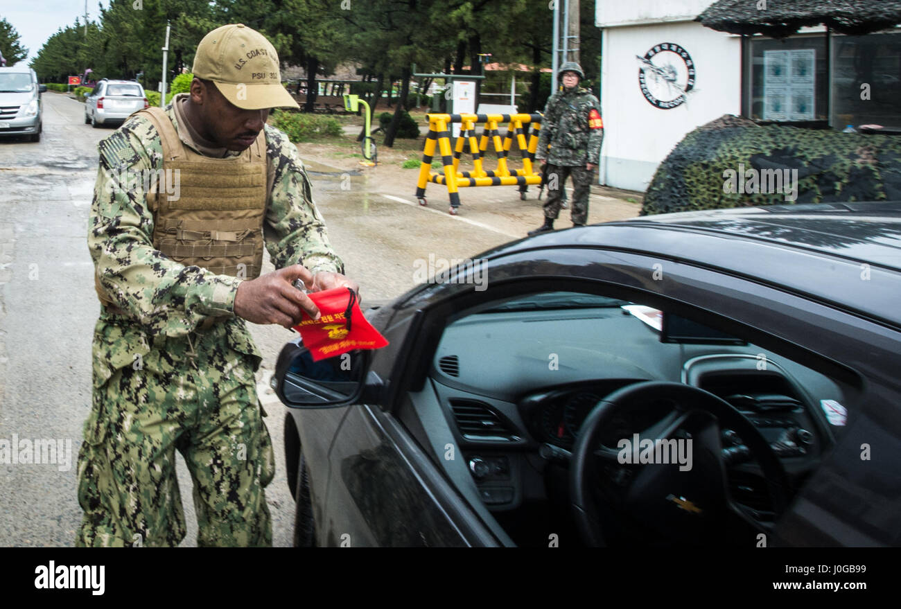 U.S. Coast Guard Maritime Enforcement 1st Class Terrence Gray, assigned ...