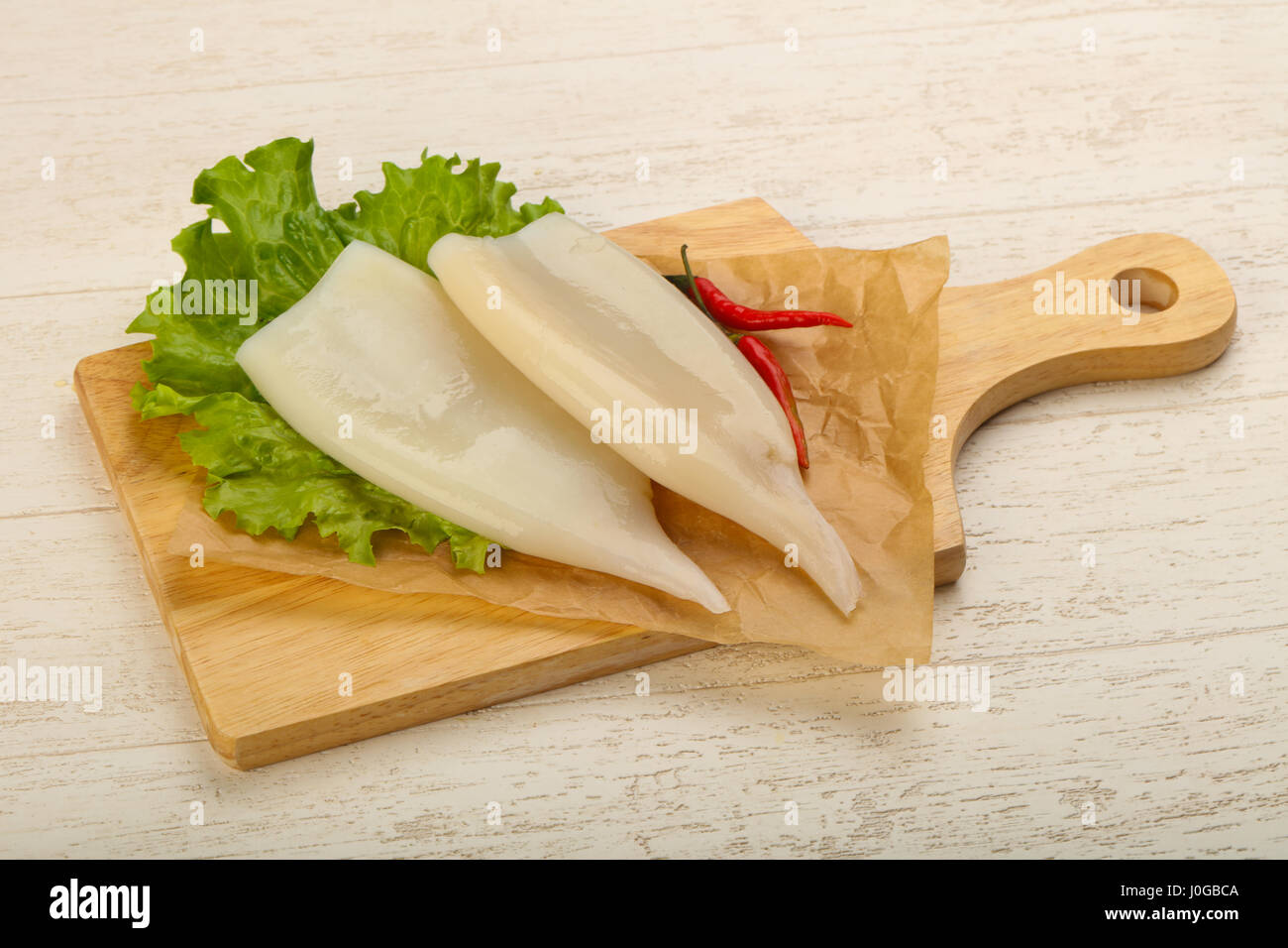 Raw squid fillet ready for cooking Stock Photo - Alamy