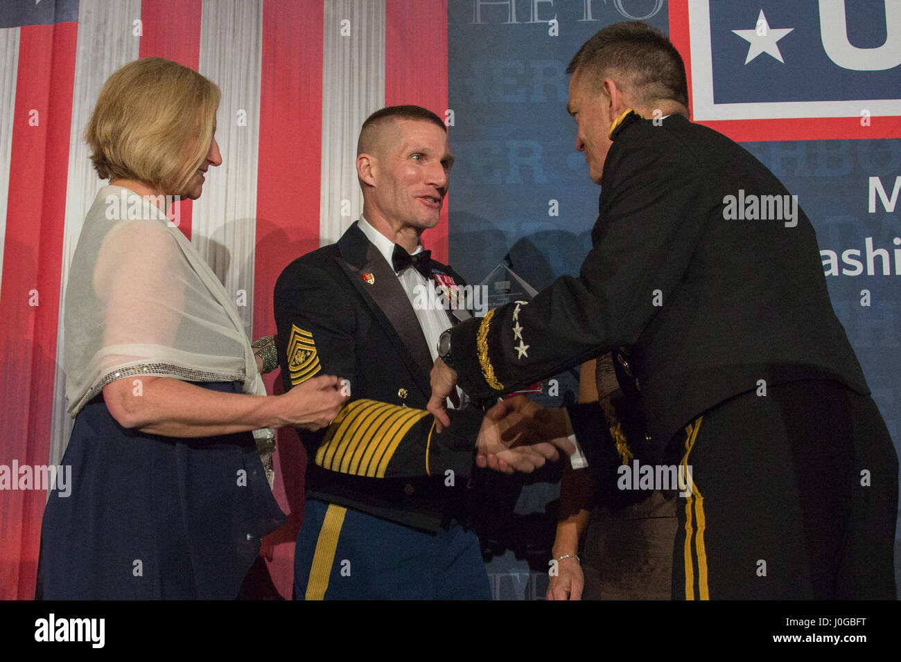 Sergeant Major of the Army Sgt. Maj. Daniel A. Dailey, center, shakes ...