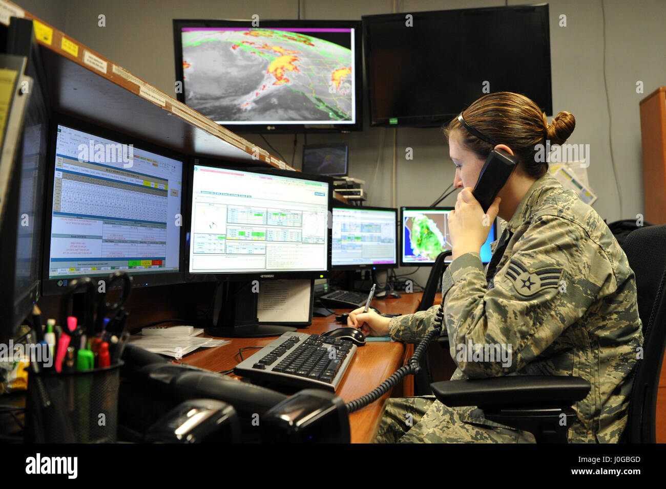 Senior Airman Jennifer Smith, 9th OSS weather technician, keeps the ...