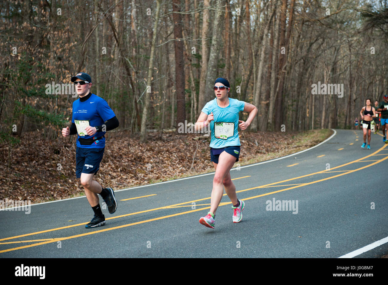 Jennifer Fraley, right, runs the course during the Marine Corps ...