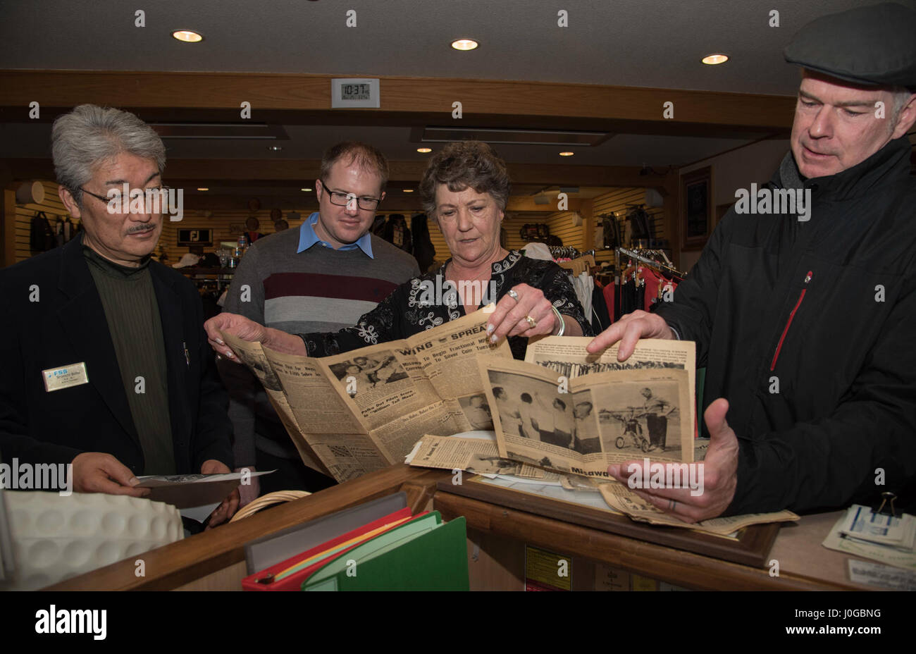 Shinichi Baba, left, the Gosser Golf Course assistant manager, Joshua ...