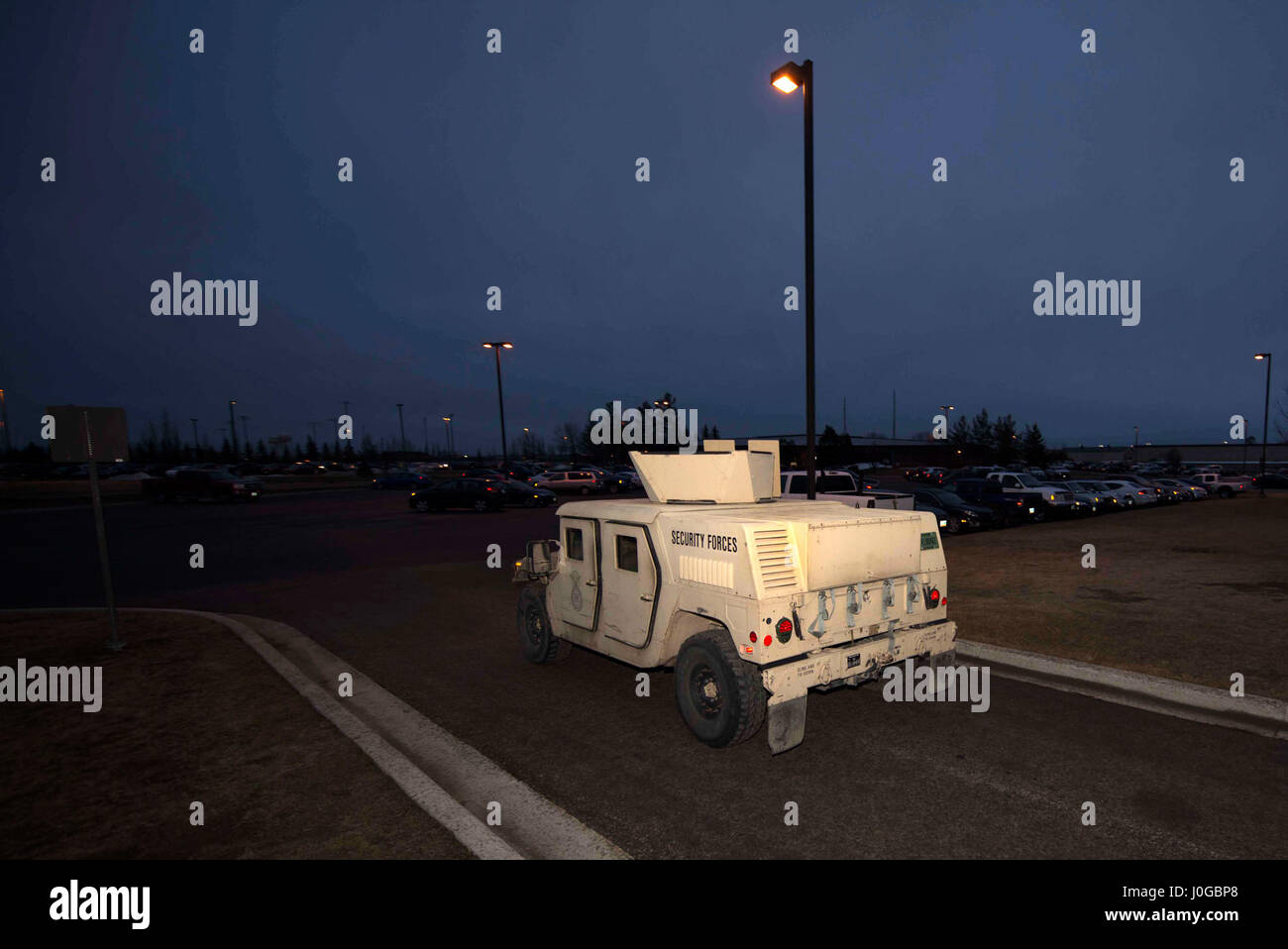A Humvee departs the 91st Security Support Squadron’s vehicle building ...