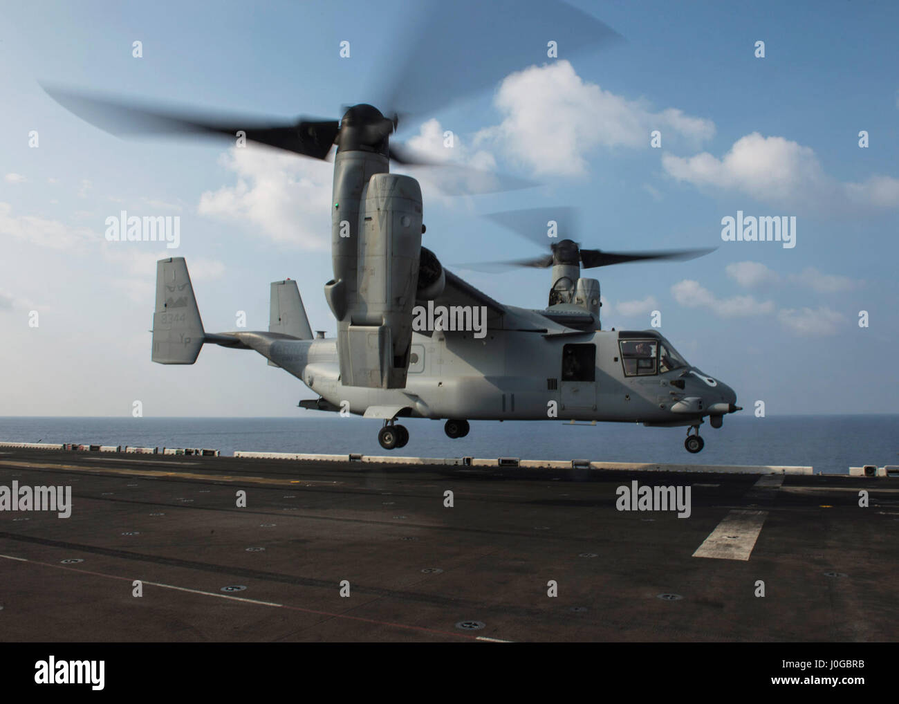 An MV-22B Osprey assigned to Marine Medium Tiltrotor Squadron 163 lands ...