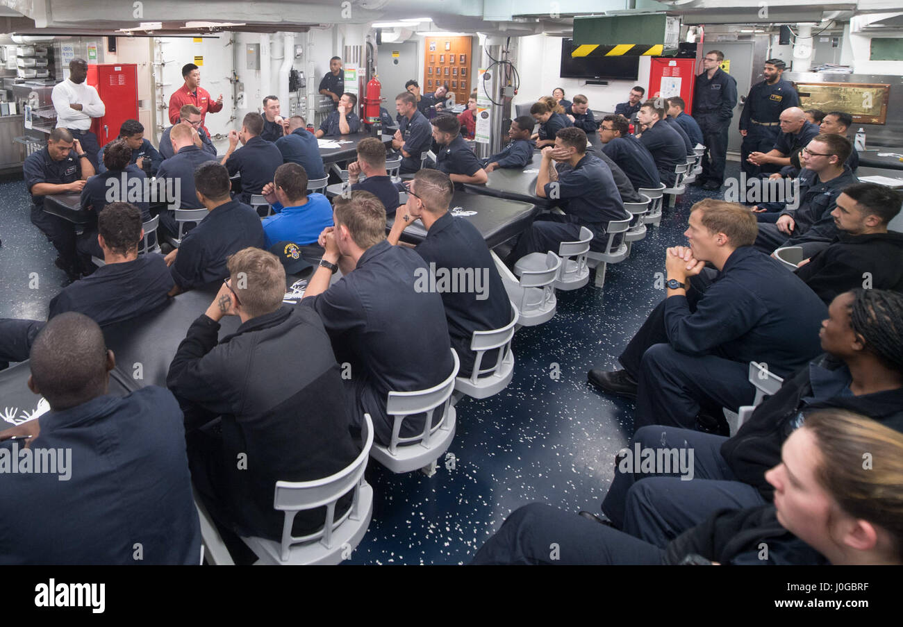 170327-N-PP996-236 SOUTH CHINA SEA (March 27, 2017) Sailors gather on ...