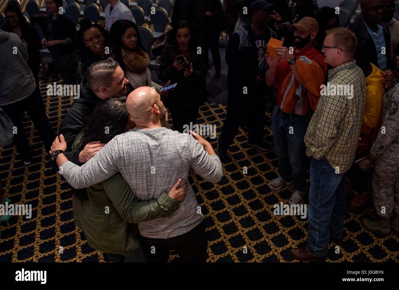 Victor Almanzar poses for photo with audience members after a ...