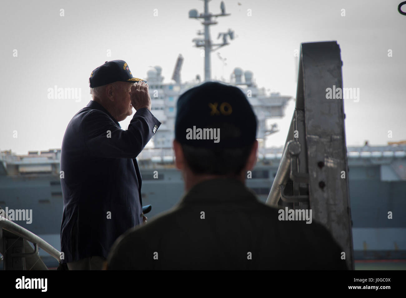 The aircraft carrier USS Dwight D. Eisenhower (CVN 69) is pier side in ...
