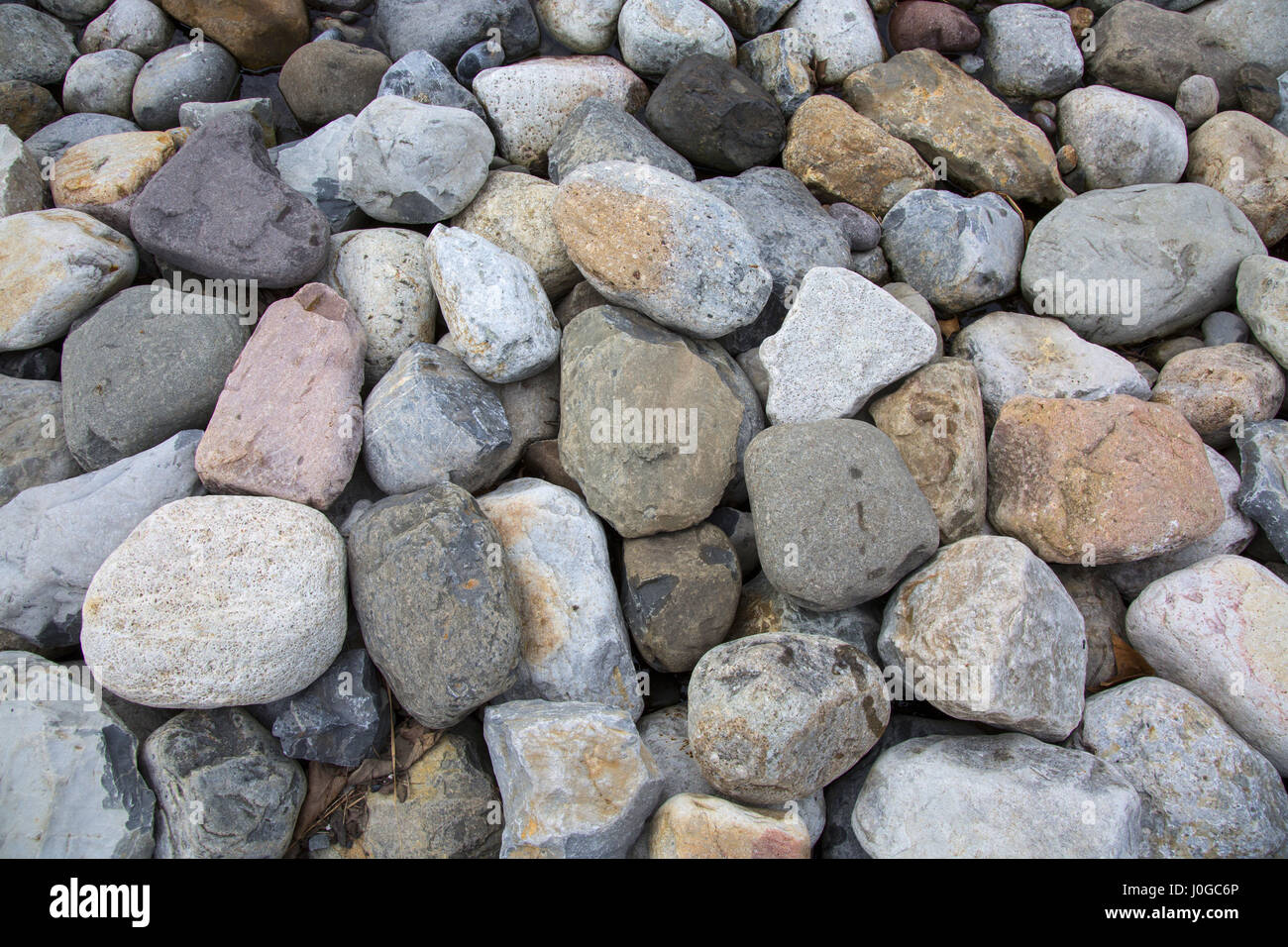 Rounded river rocks hi-res stock photography and images - Alamy