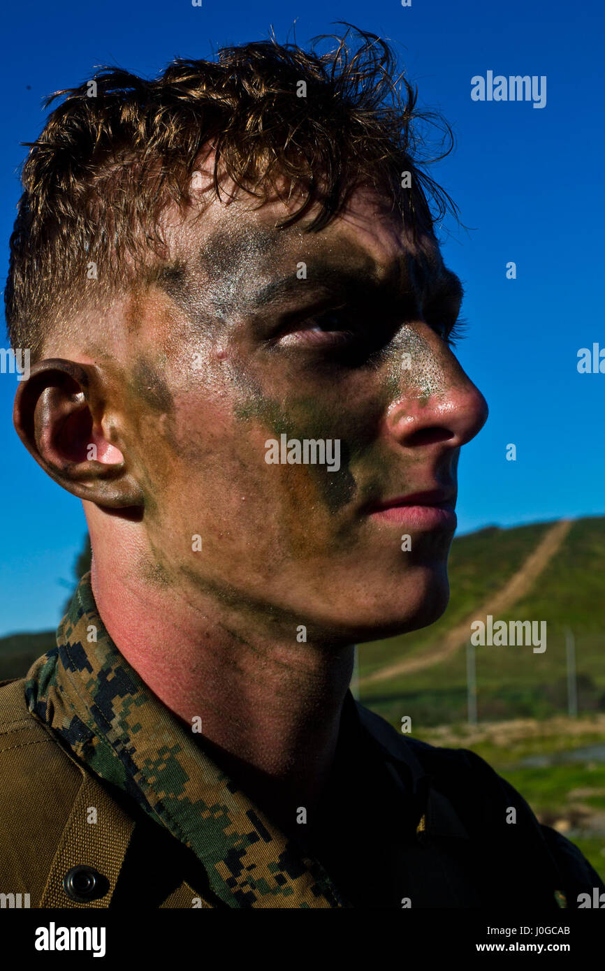 U.S. Marine Corps Lance Cpl. Dulton S. Griffith, assigned to the Armory ...