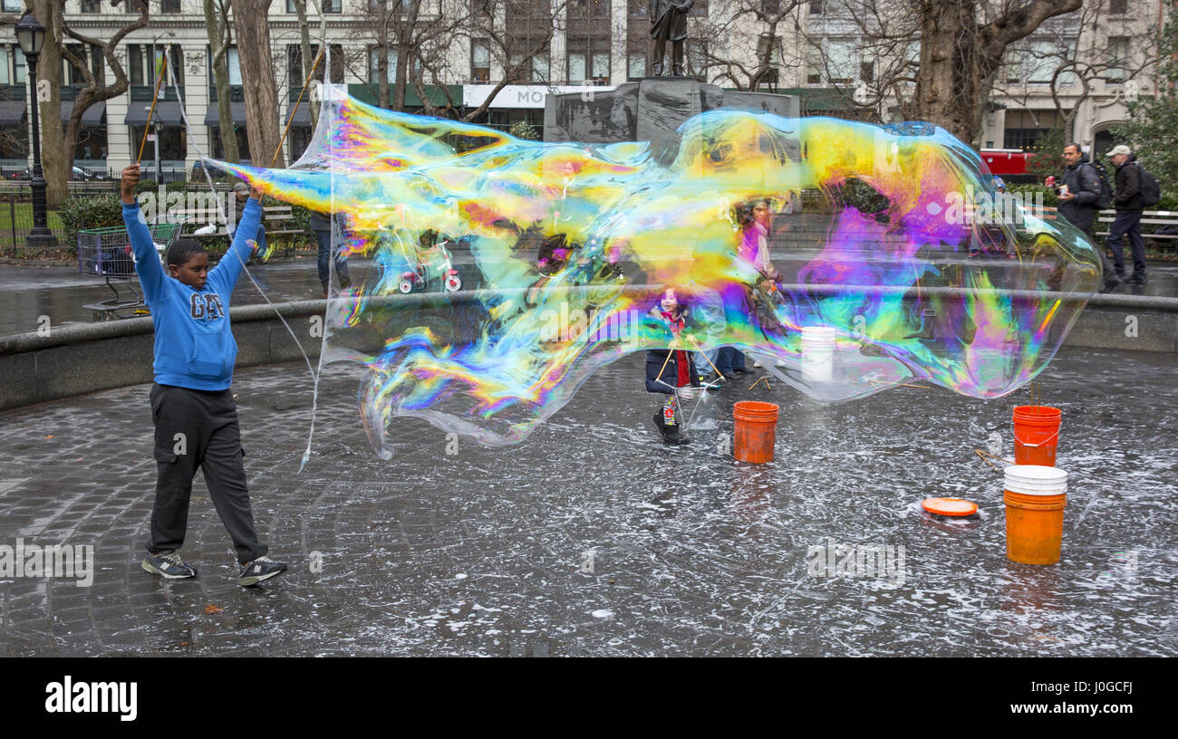 Children have fun learning to make giant soap bubbles at Madison Park ...