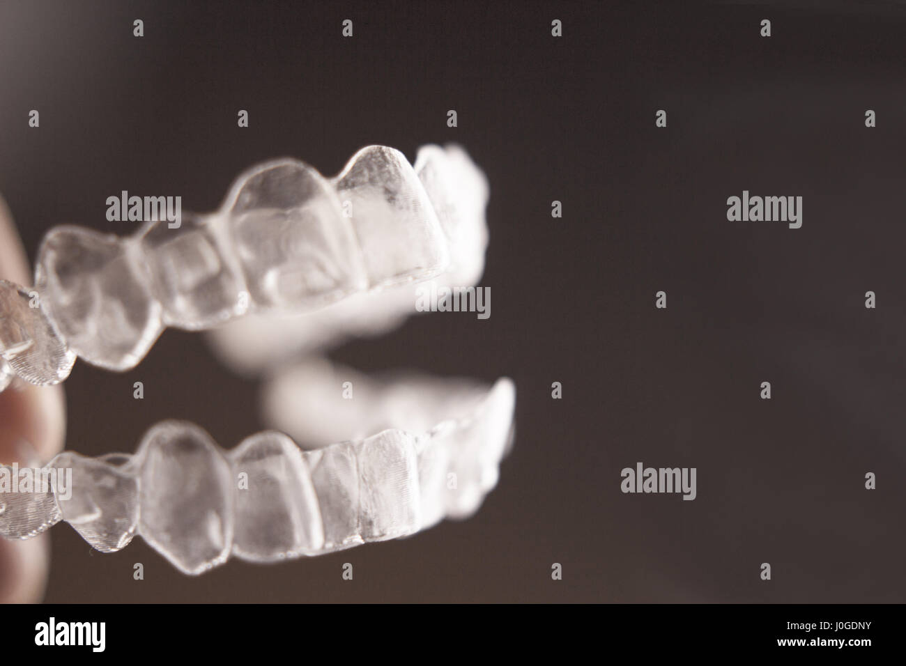 Denture invisible teeth aligner Stock Photo - Alamy