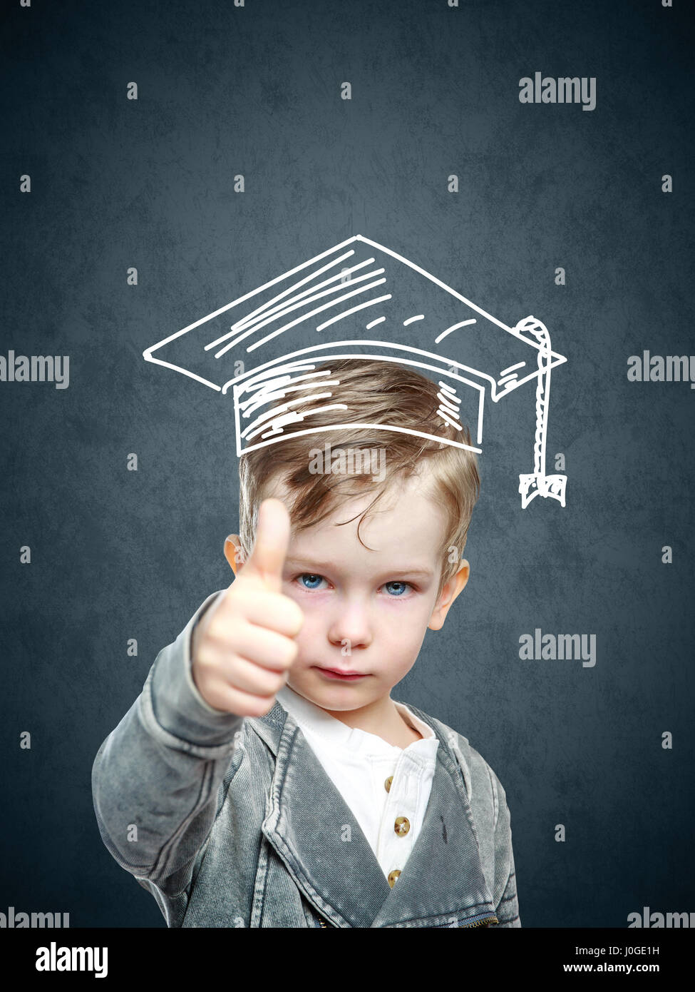 Smart child in a drawn student hat Stock Photo - Alamy