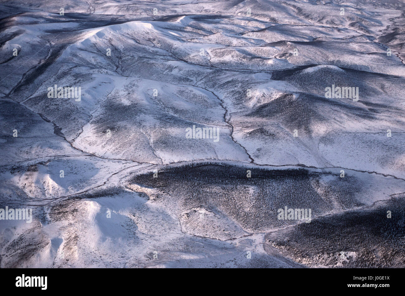 Aerial views of Mackenzie Mountains. The Mackenzie Mountains are a ...