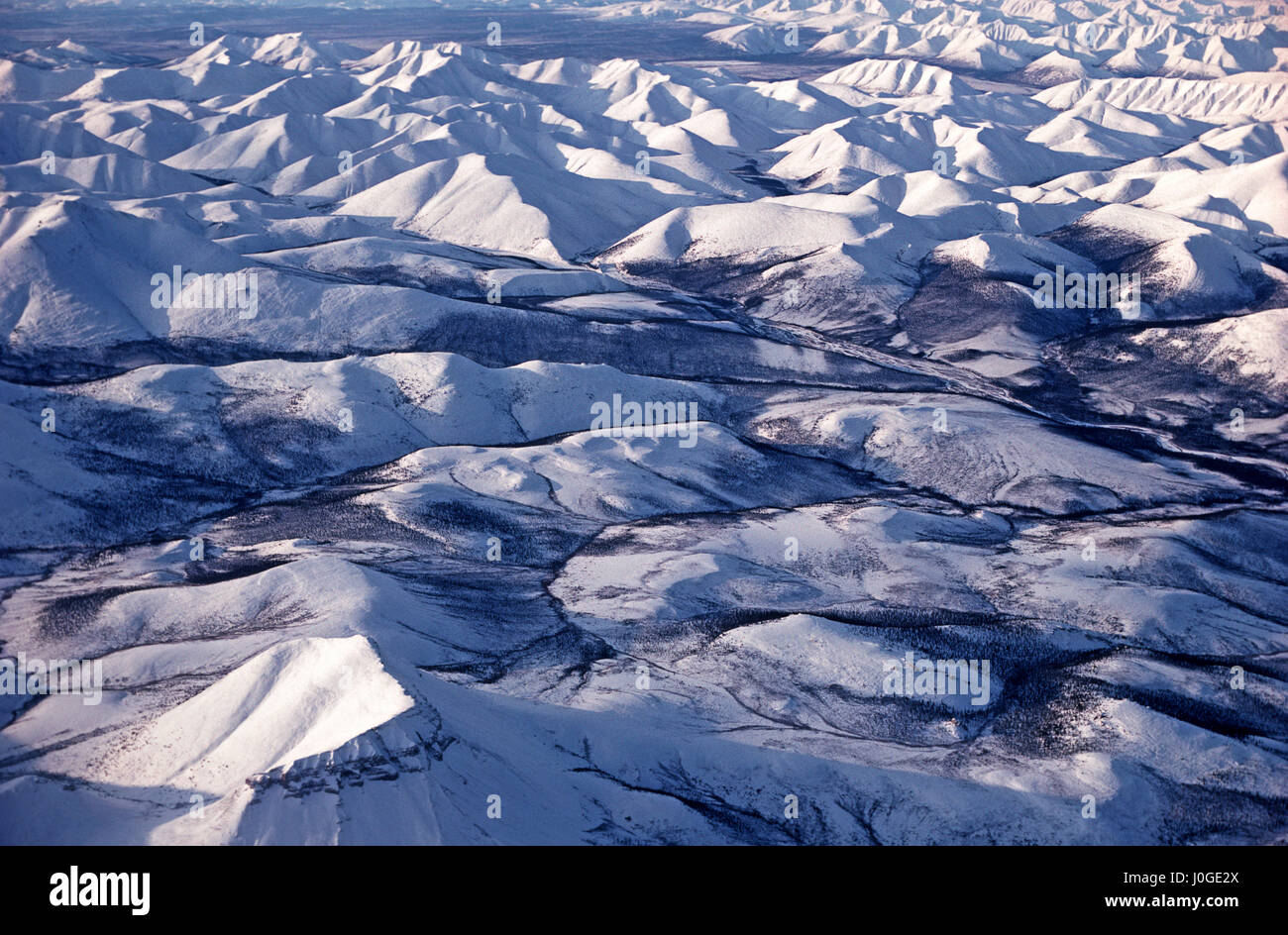 Aerial views of Mackenzie Mountains. The Mackenzie Mountains are a ...