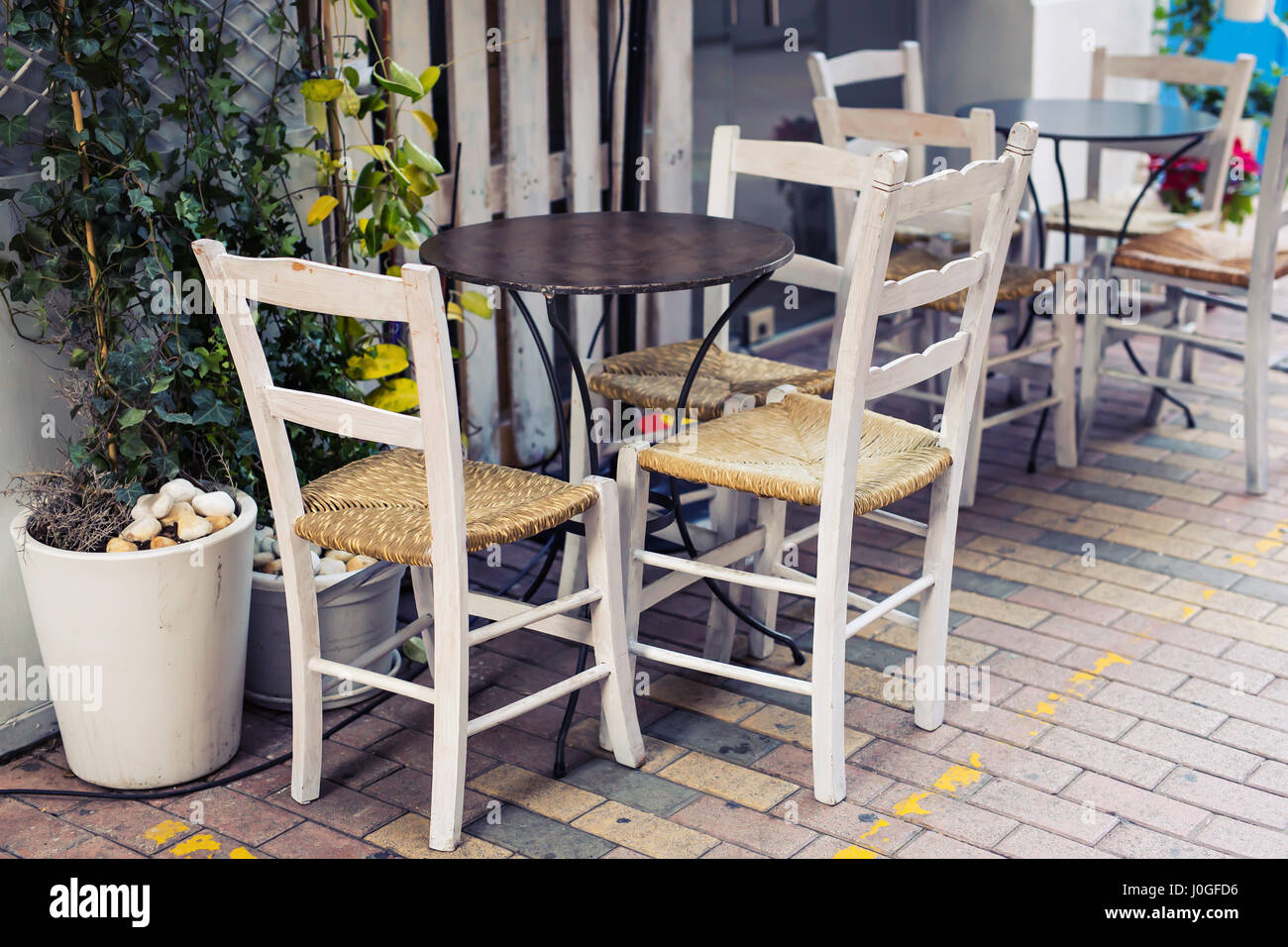 Street cafe. Cozy outdoor restaurant Stock Photo - Alamy