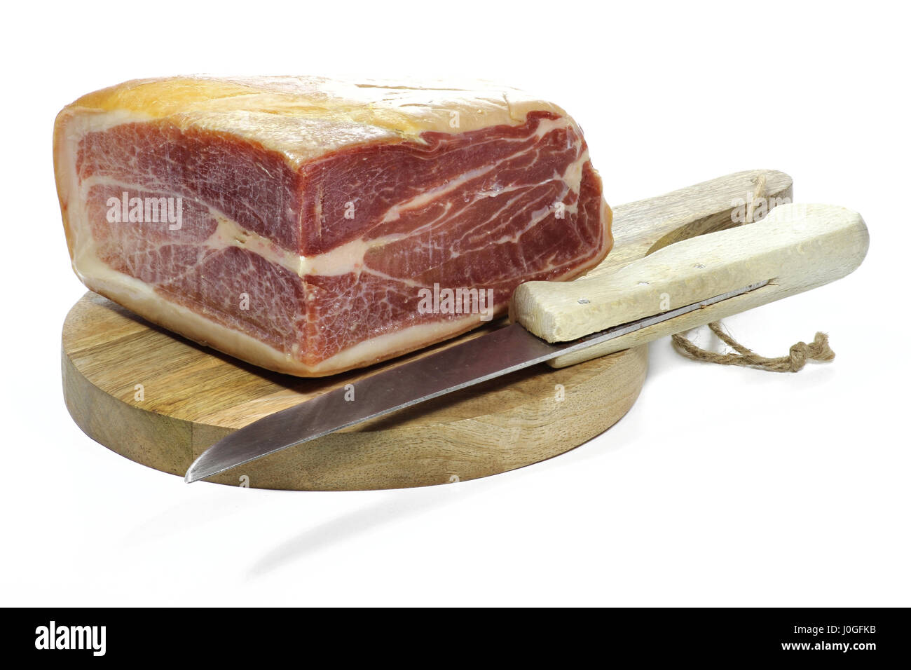 Italian dry-cured ham isolated on white background Stock Photo - Alamy