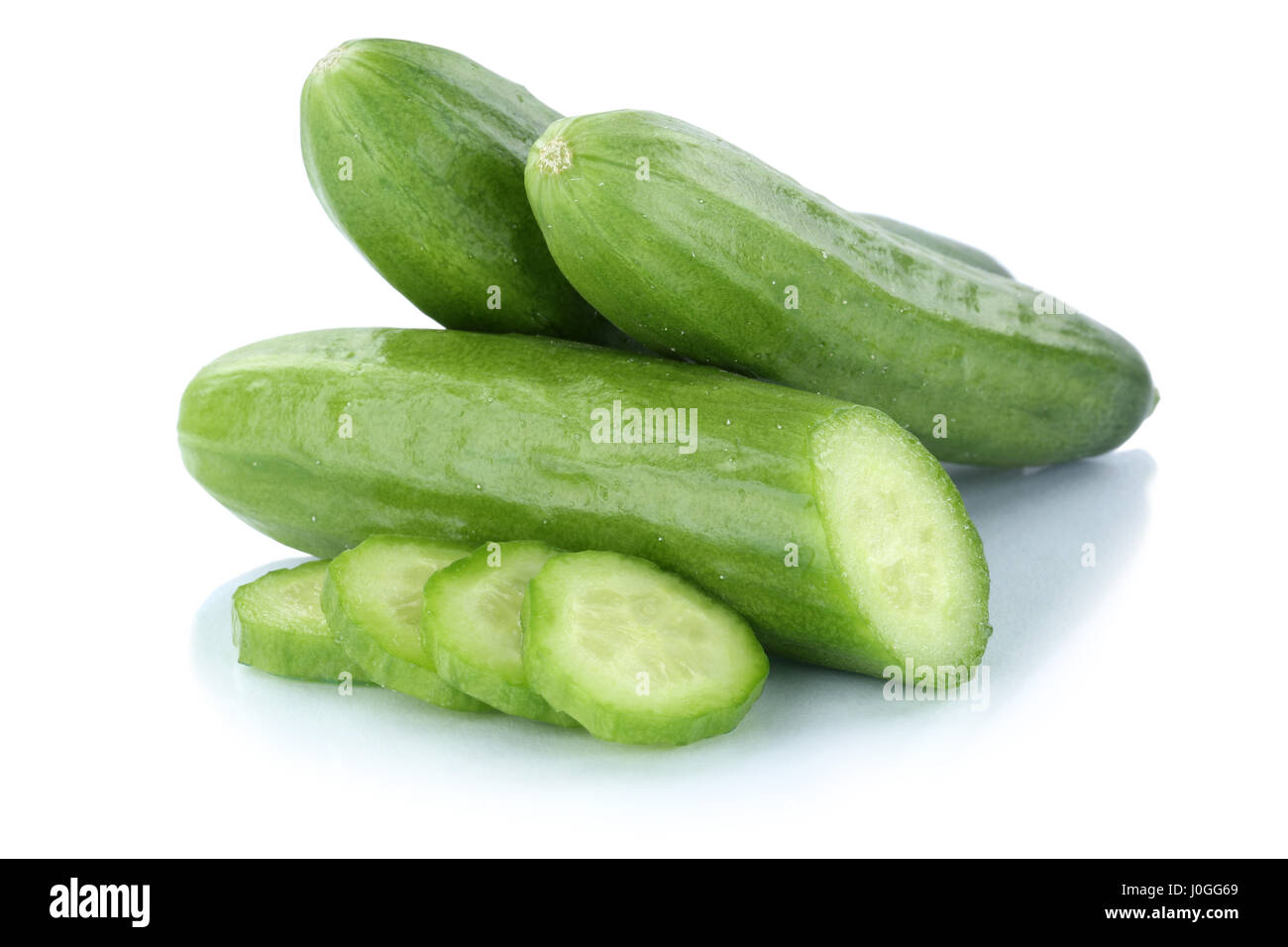Cucumbers cucumber sliced slice vegetable isolated on a white ...