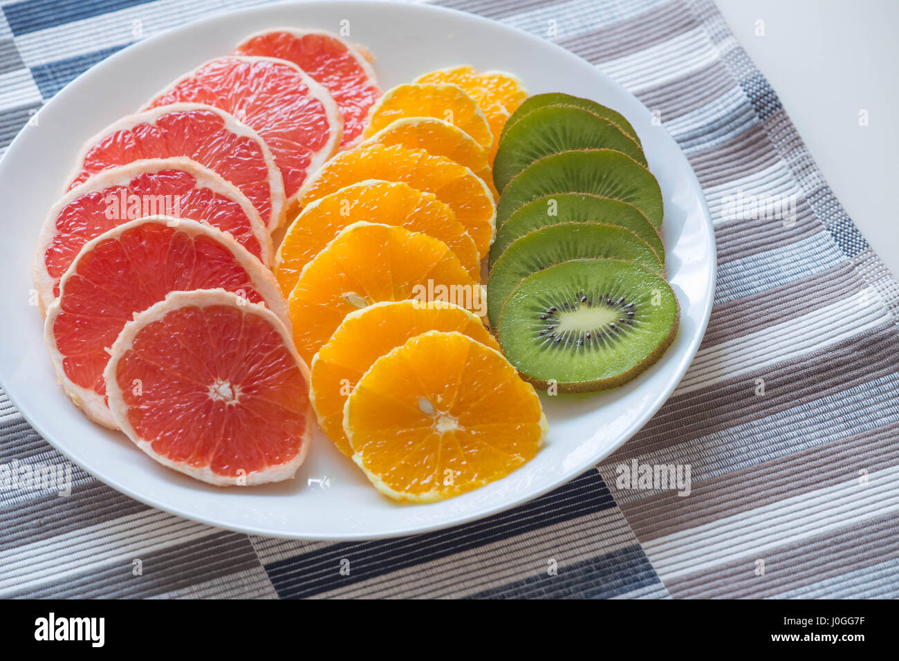 Fresh cutting fruits / vitamins concept Stock Photo - Alamy