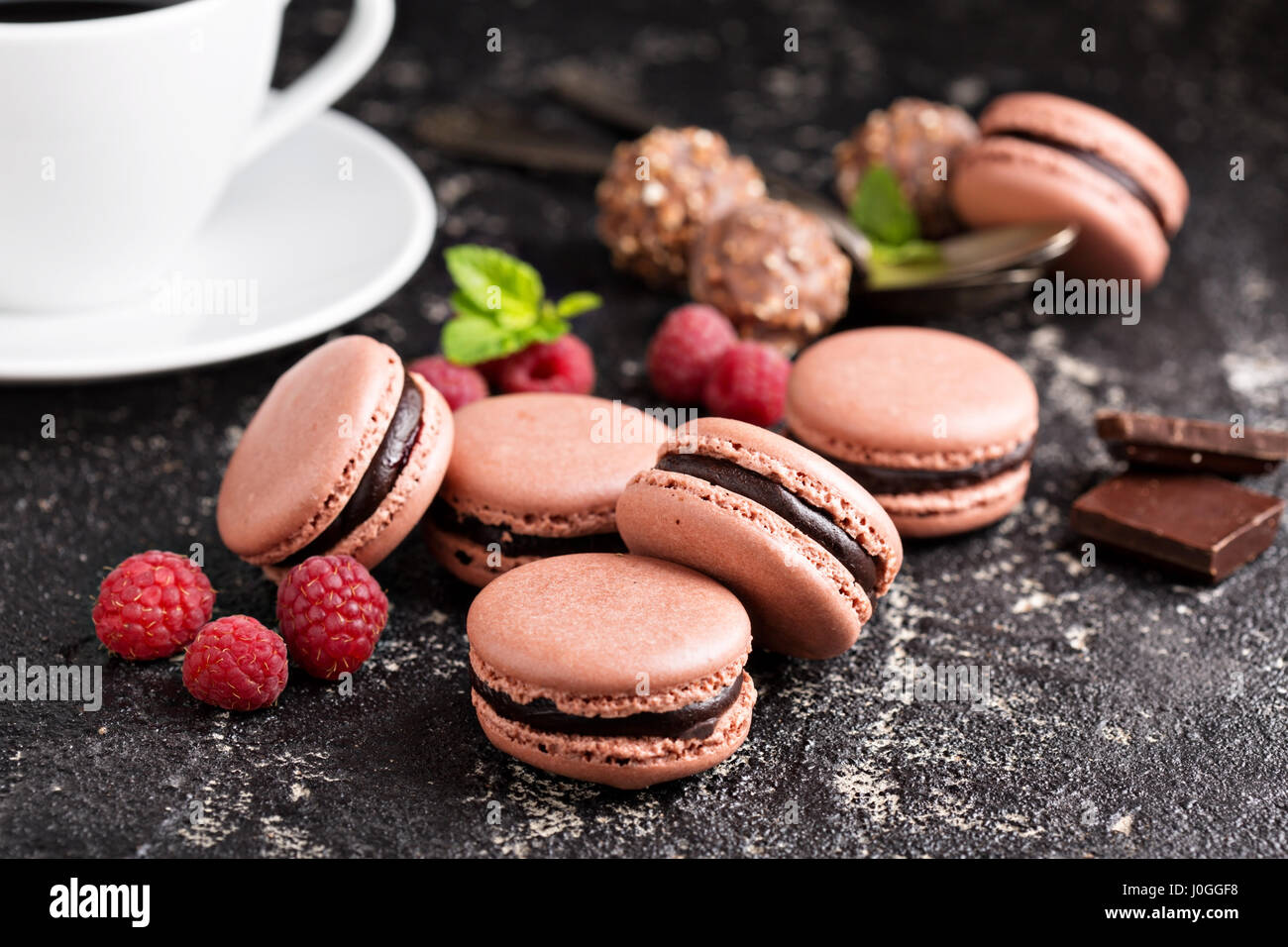 Chocolate and raspberry french macarons with ganache filling Stock ...