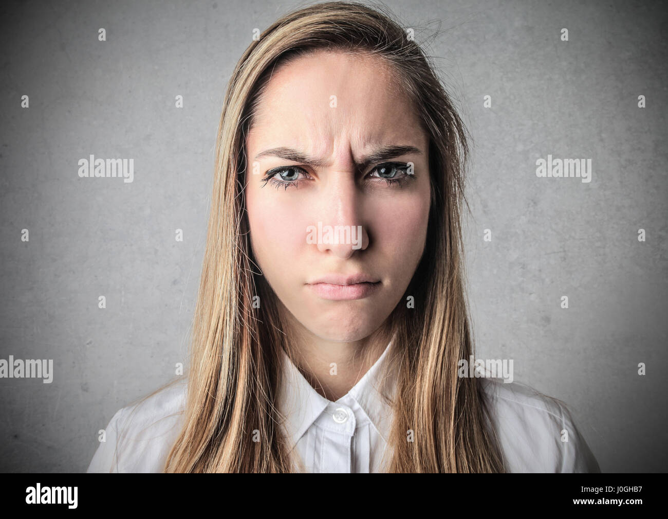 Blond woman being mad Stock Photo - Alamy