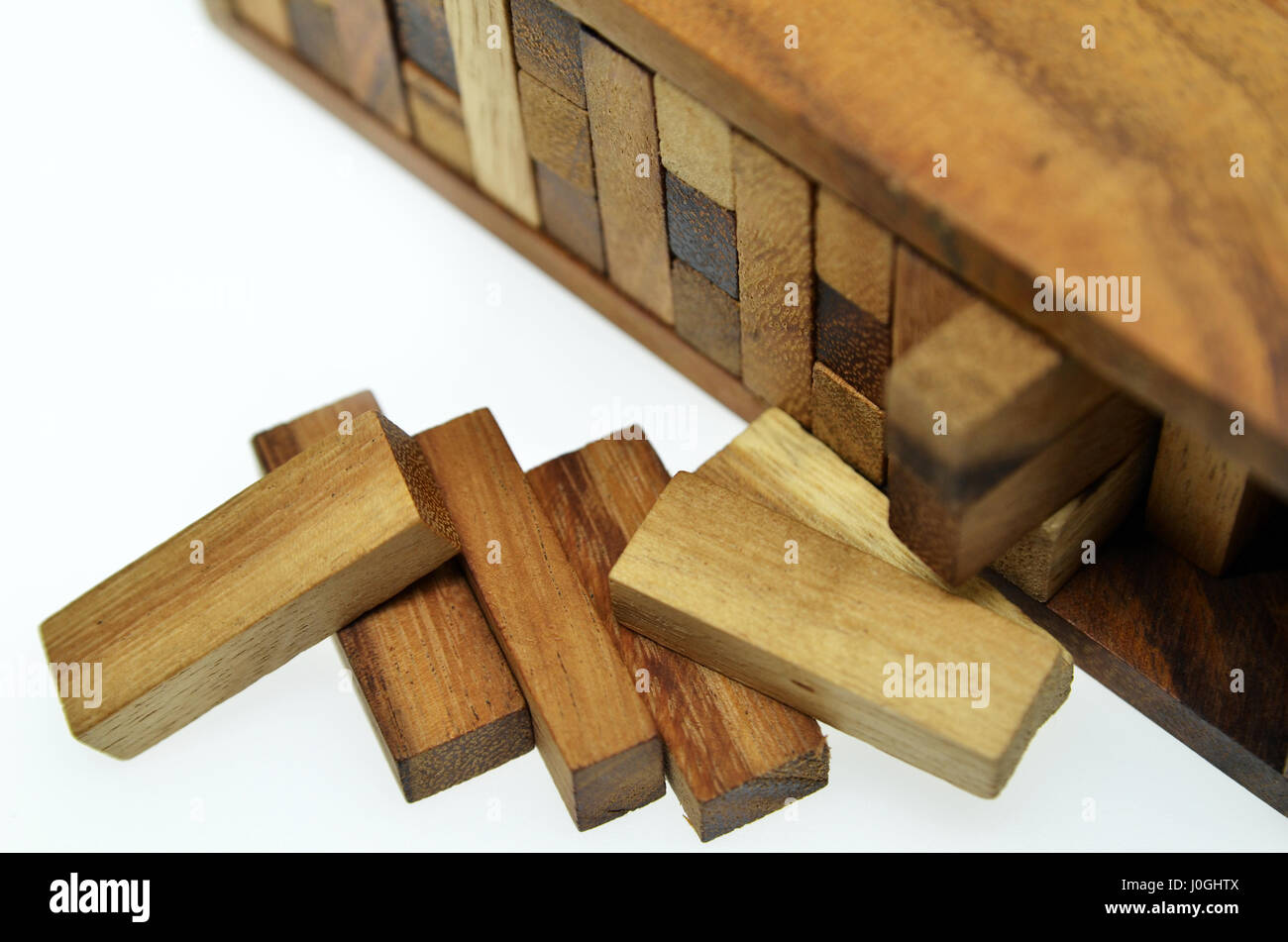 Blocks wood Jenga game on white background Stock Photo - Alamy