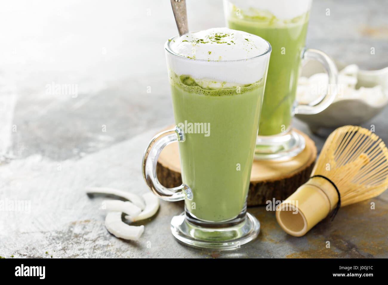 Matcha coconut latte in tall glasses Stock Photo - Alamy