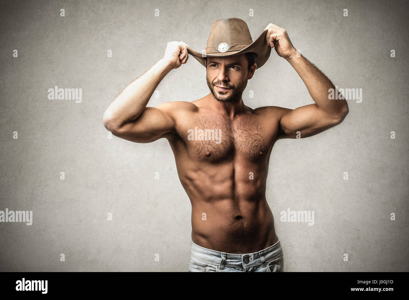 Shirtless cowboy man Stock Photo - Alamy