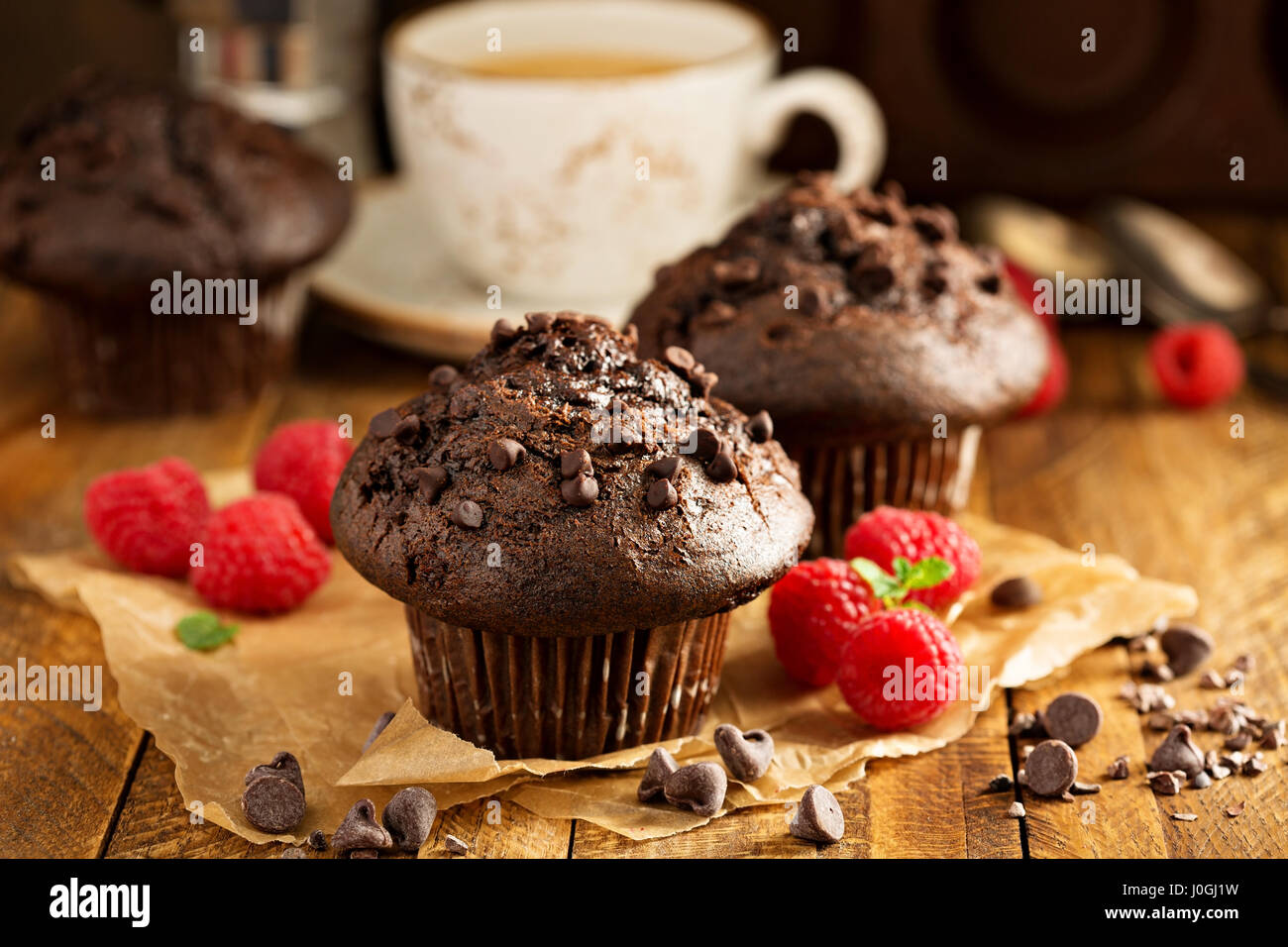 Double chocolate muffins with raspberry Stock Photo - Alamy