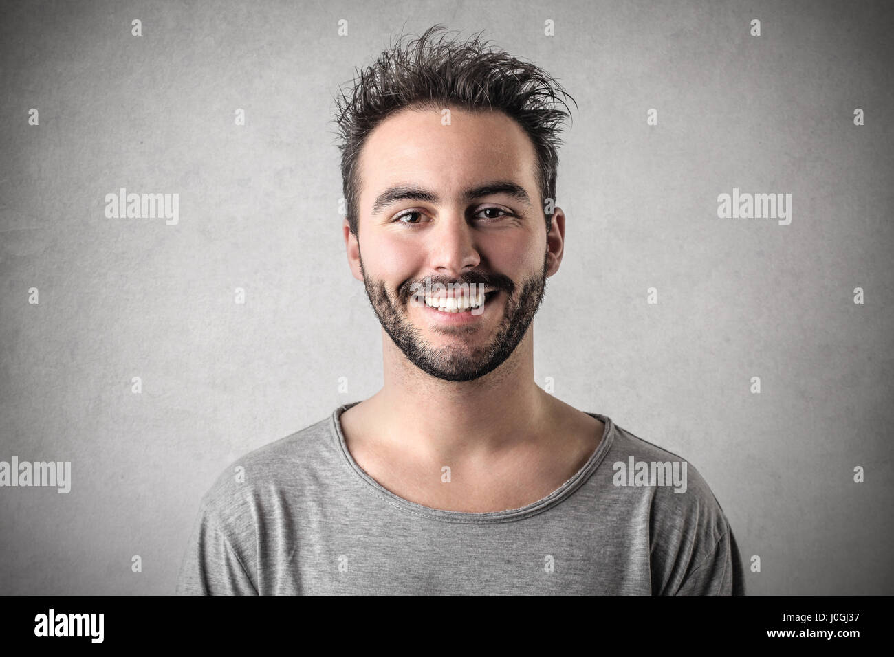 Man smiling inside Stock Photo - Alamy
