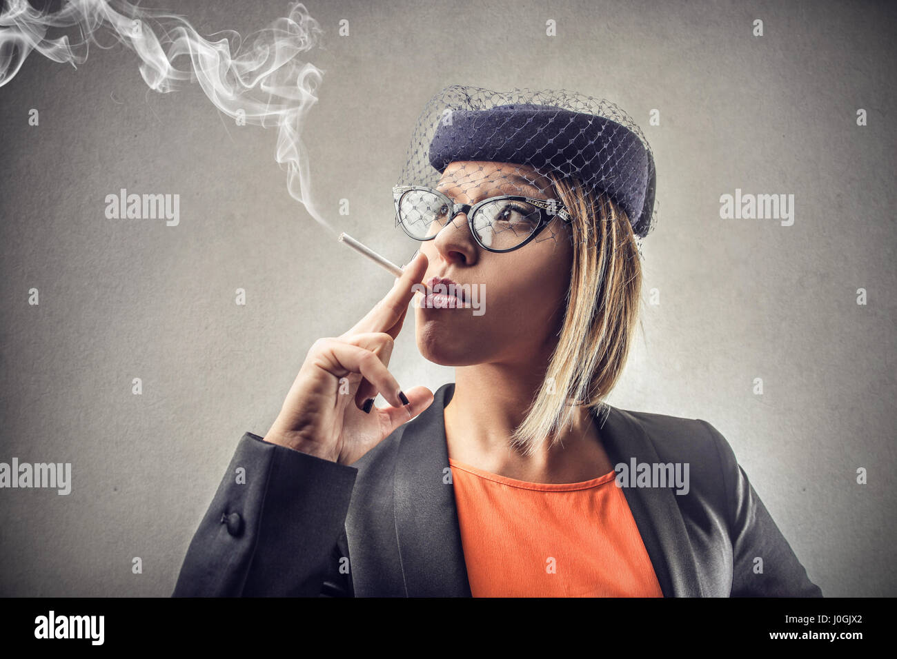 Young Teen Woman Smoking Cigarette Stock Photos & Young Teen Woman ...