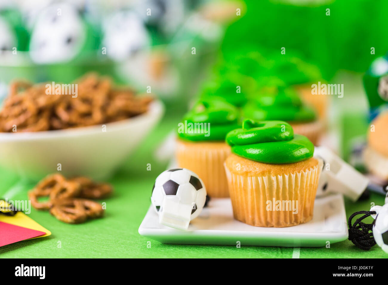 Kids football party set with snacks and drinks Stock Photo - Alamy