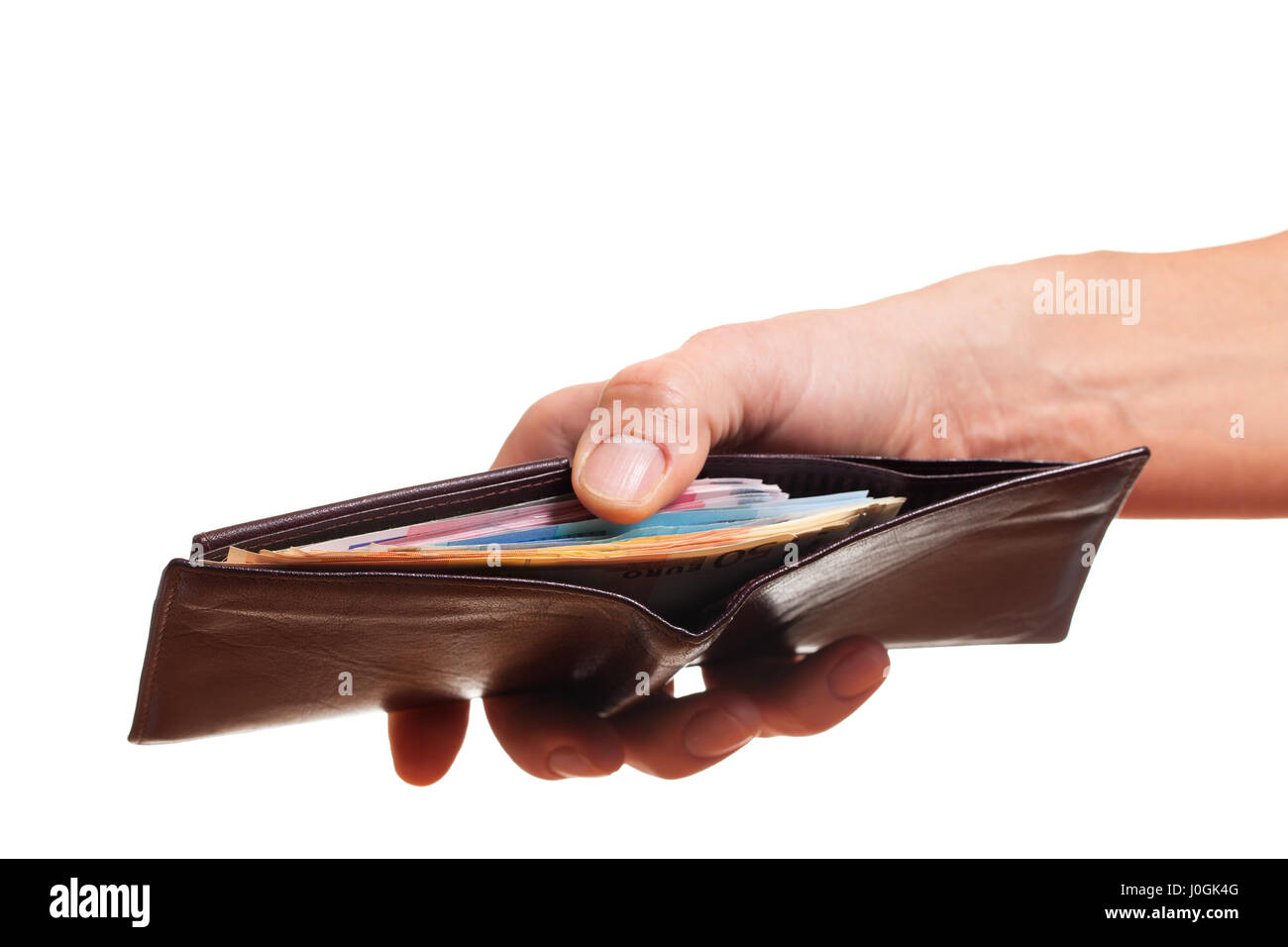 Purse in hand isolated on white Stock Photo - Alamy