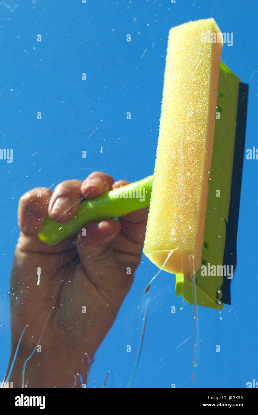 Human hand washing window in nice summer day Stock Photo - Alamy