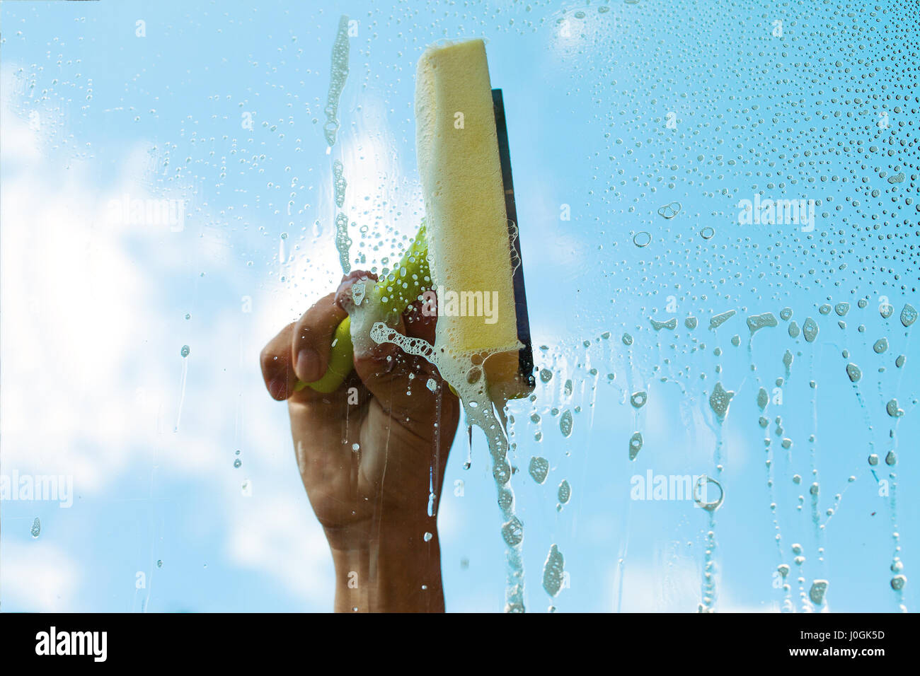 Human hand washing window in nice summer day Stock Photo - Alamy