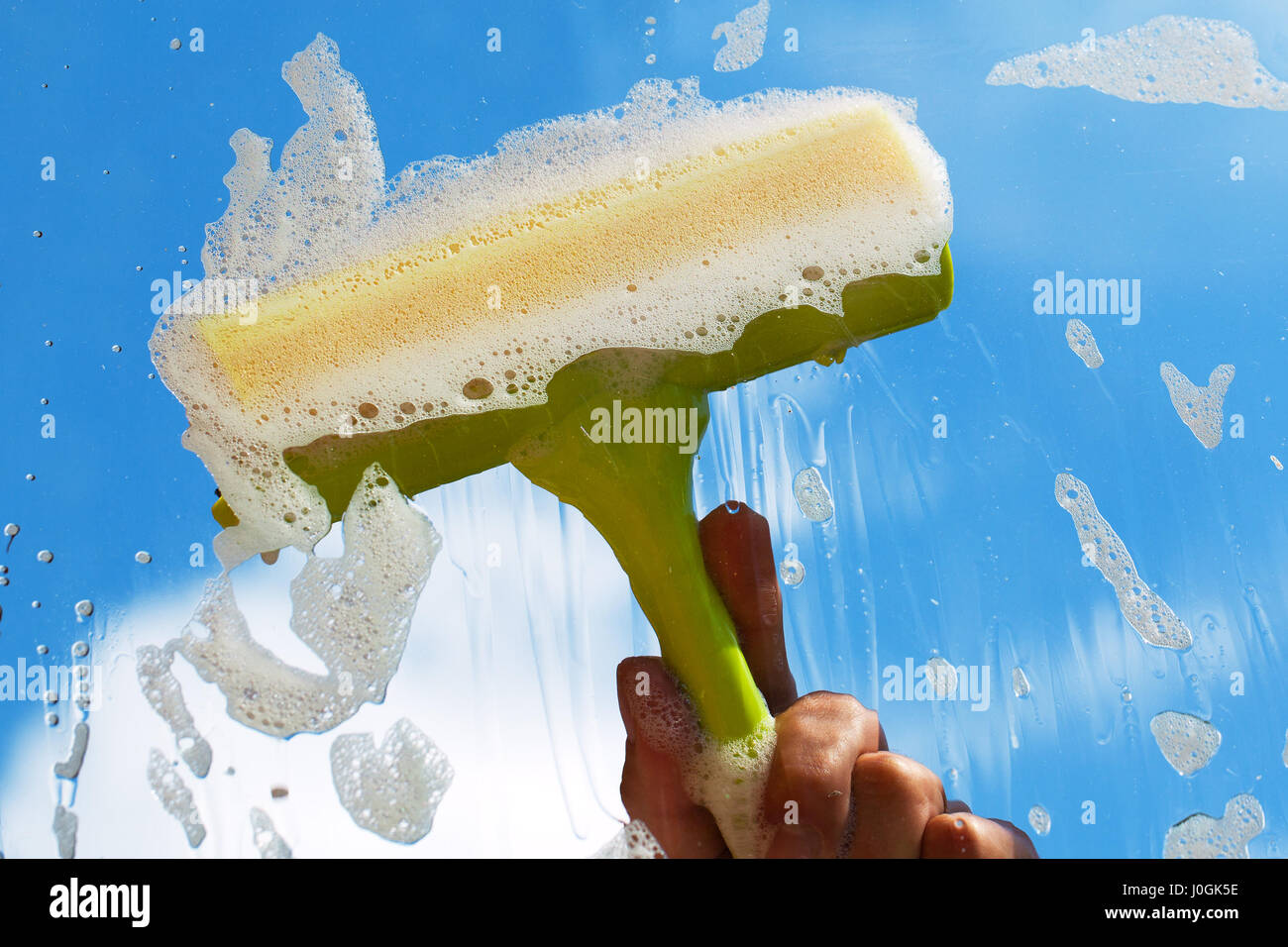 Human hand washing window in nice summer day Stock Photo - Alamy