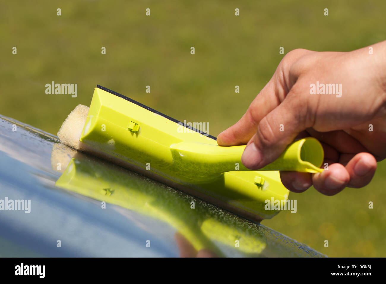Hand washing car window Stock Photo - Alamy