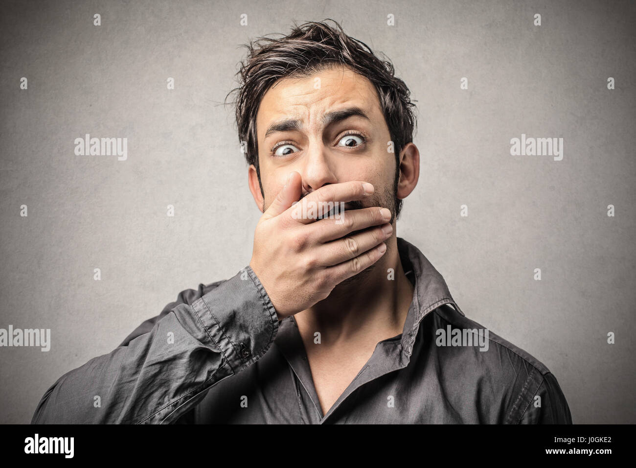 Bearded man being frightened Stock Photo - Alamy