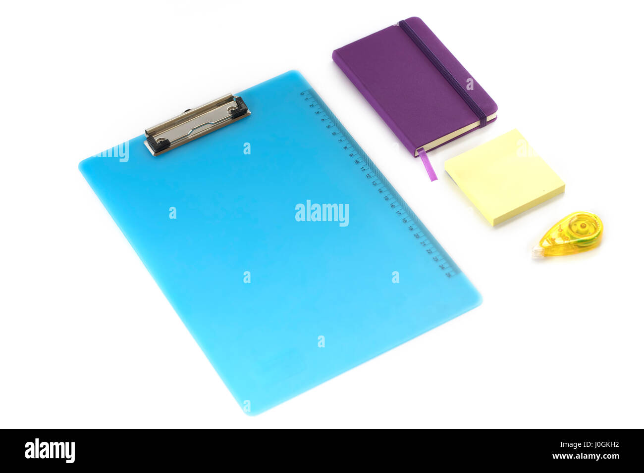 Plastic board, memory note, notebook, correction pen isolated on white ...