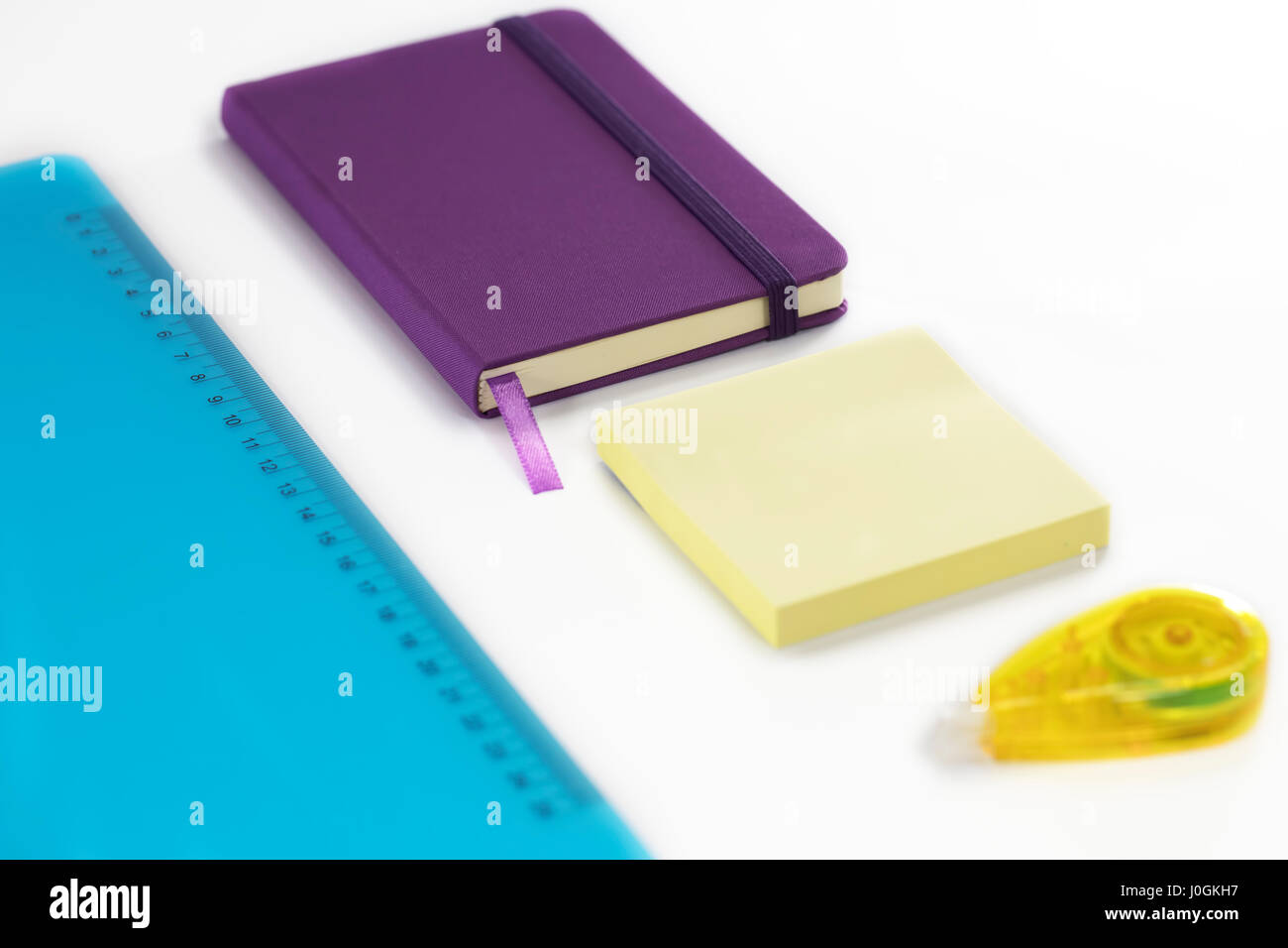 Plastic board, memory note, notebook, correction pen isolated on white ...
