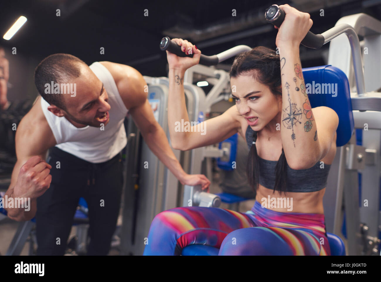 Big support from the personal trainer Stock Photo - Alamy