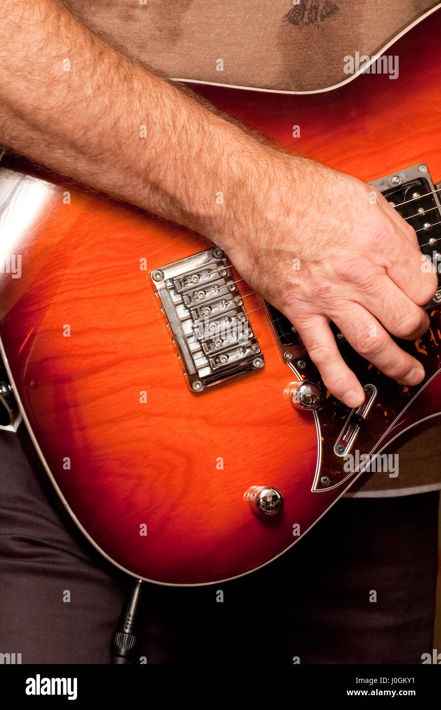 musician playing an electric guitar during a live performance Stock ...