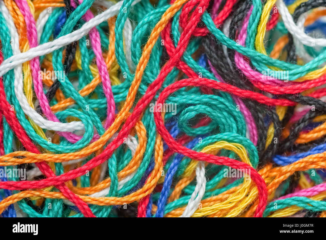 macro background of multi-colored needlecraft embroidery threads Stock ...