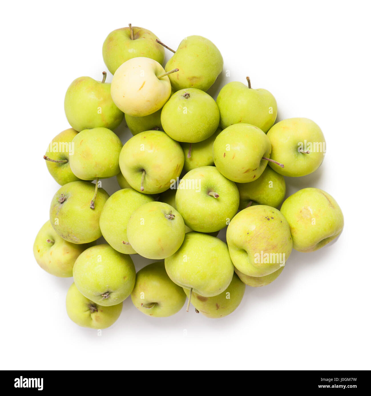 Many green apples isolated on white background Stock Photo - Alamy
