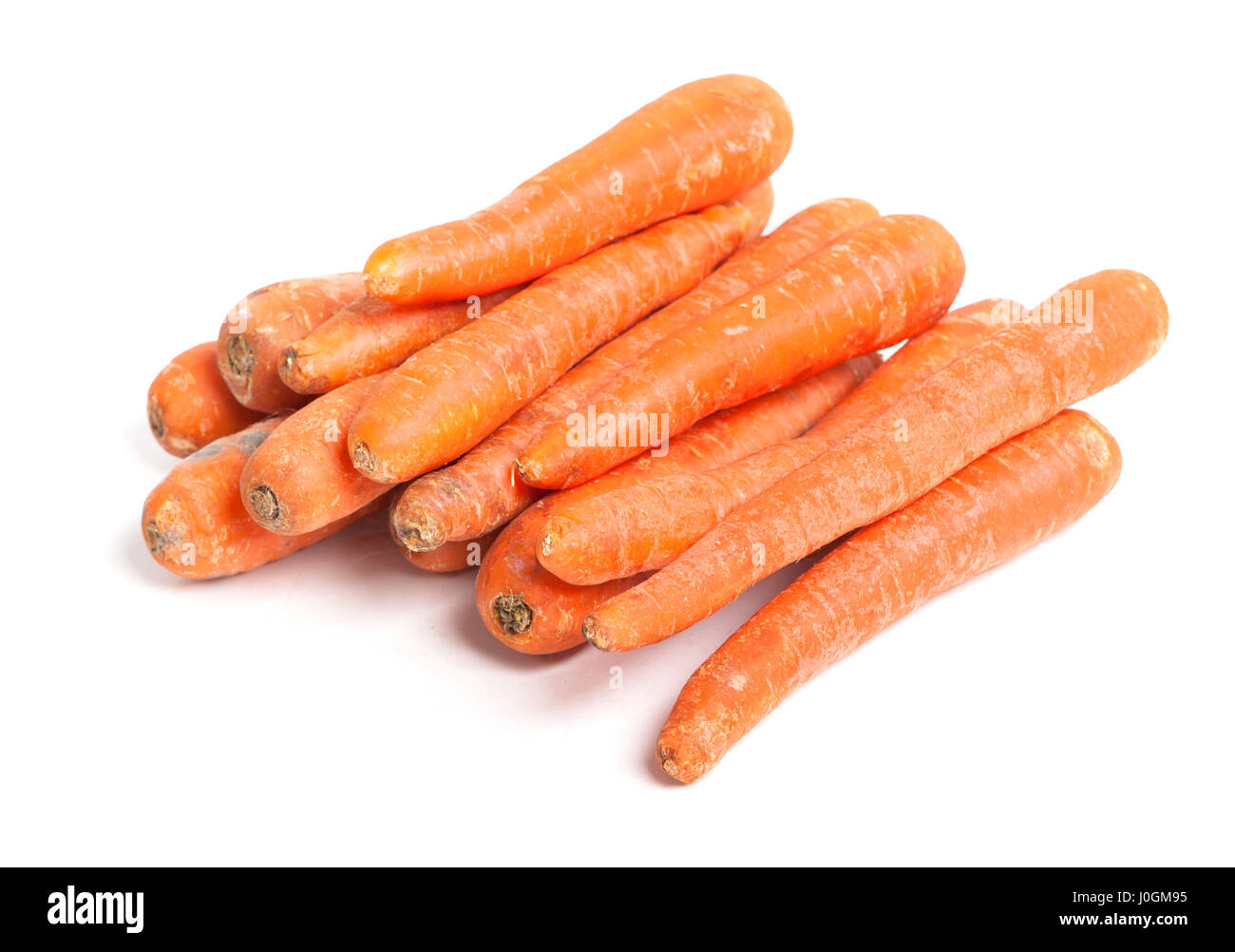 Many carrots isolated on white background Stock Photo - Alamy