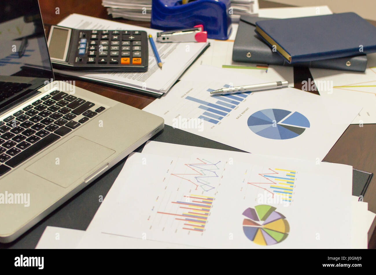 Desk office and Graph analysis spreadsheet Stock Photo - Alamy