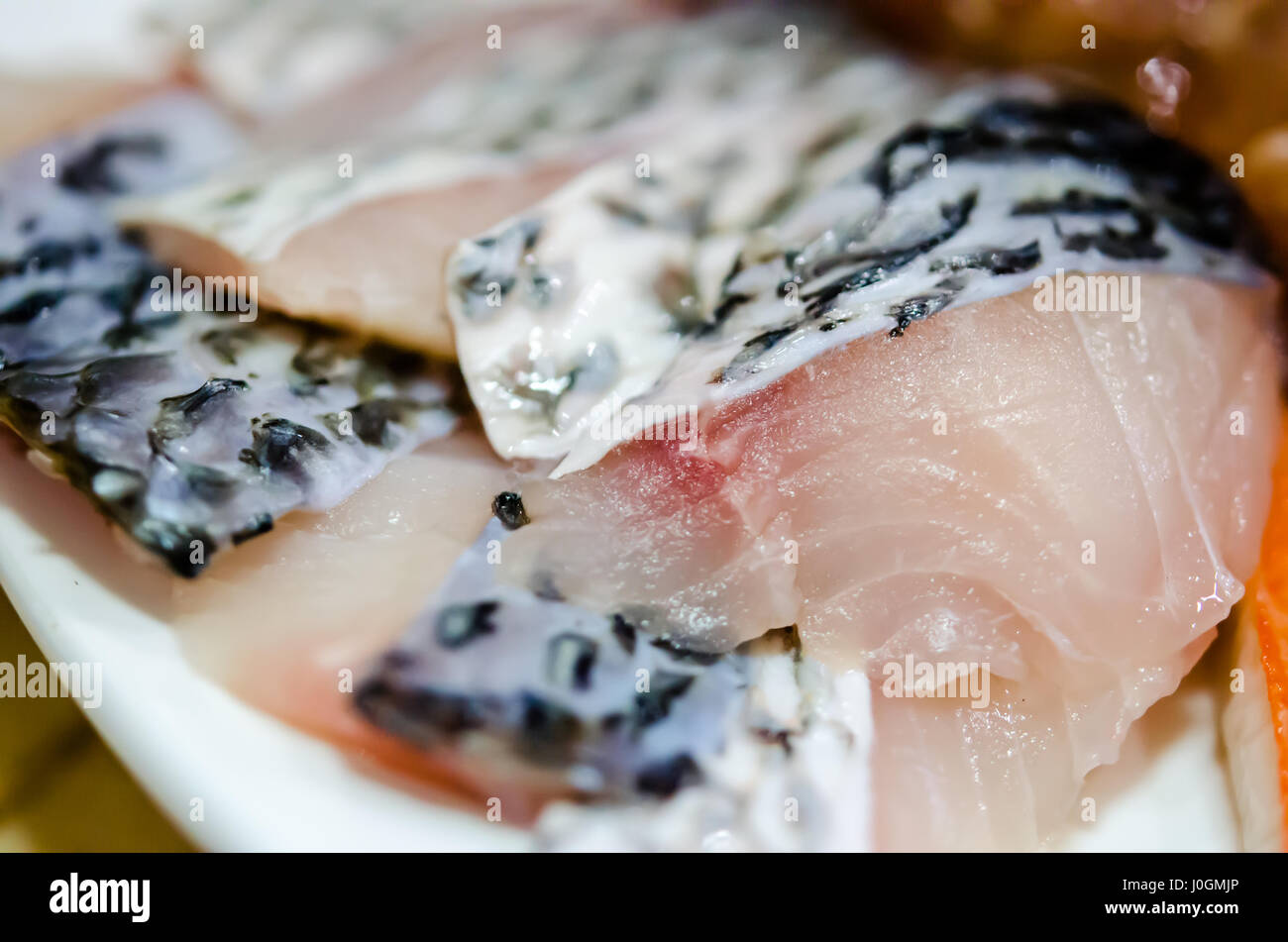 Close up fresh Fish slide Stock Photo - Alamy