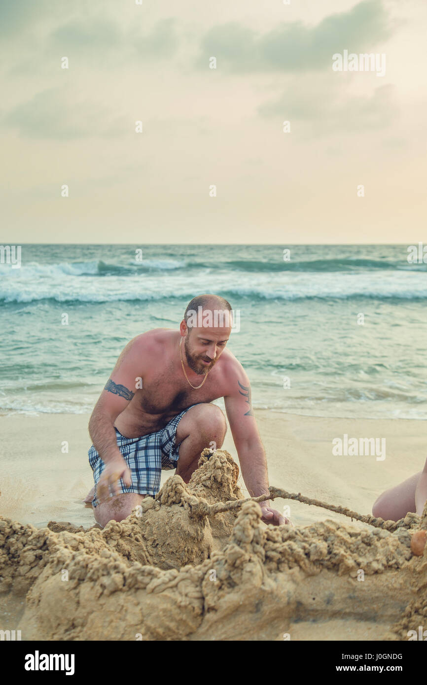 Making a sandcastle hi-res stock photography and images - Alamy