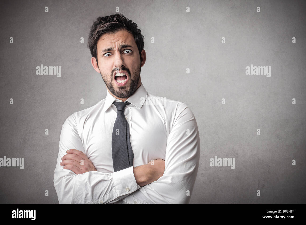 Businessman being surprised Stock Photo - Alamy
