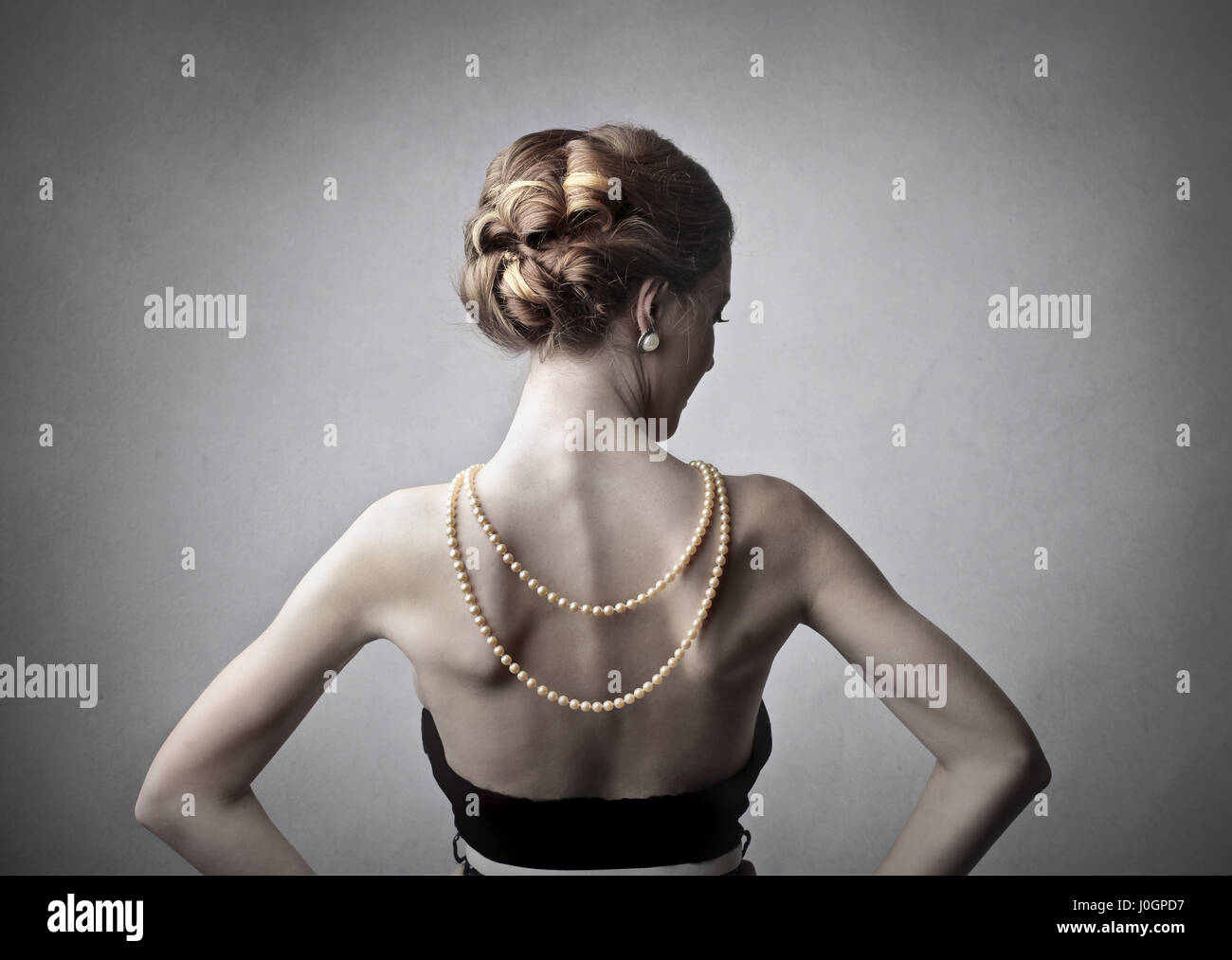 Elegant woman from behind Stock Photo - Alamy